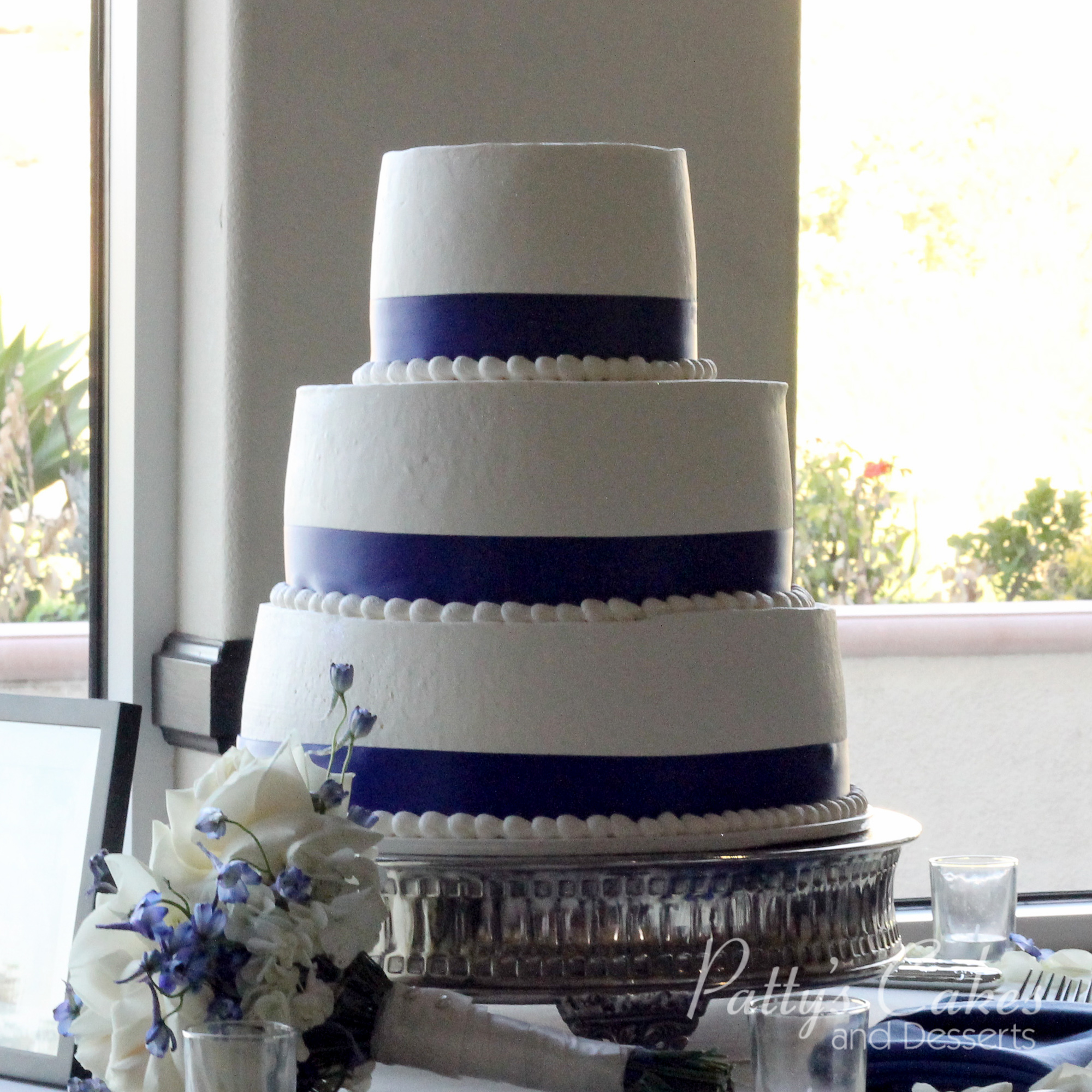 Photo of a simple wedding cake no design - Patty's Cakes and Desserts