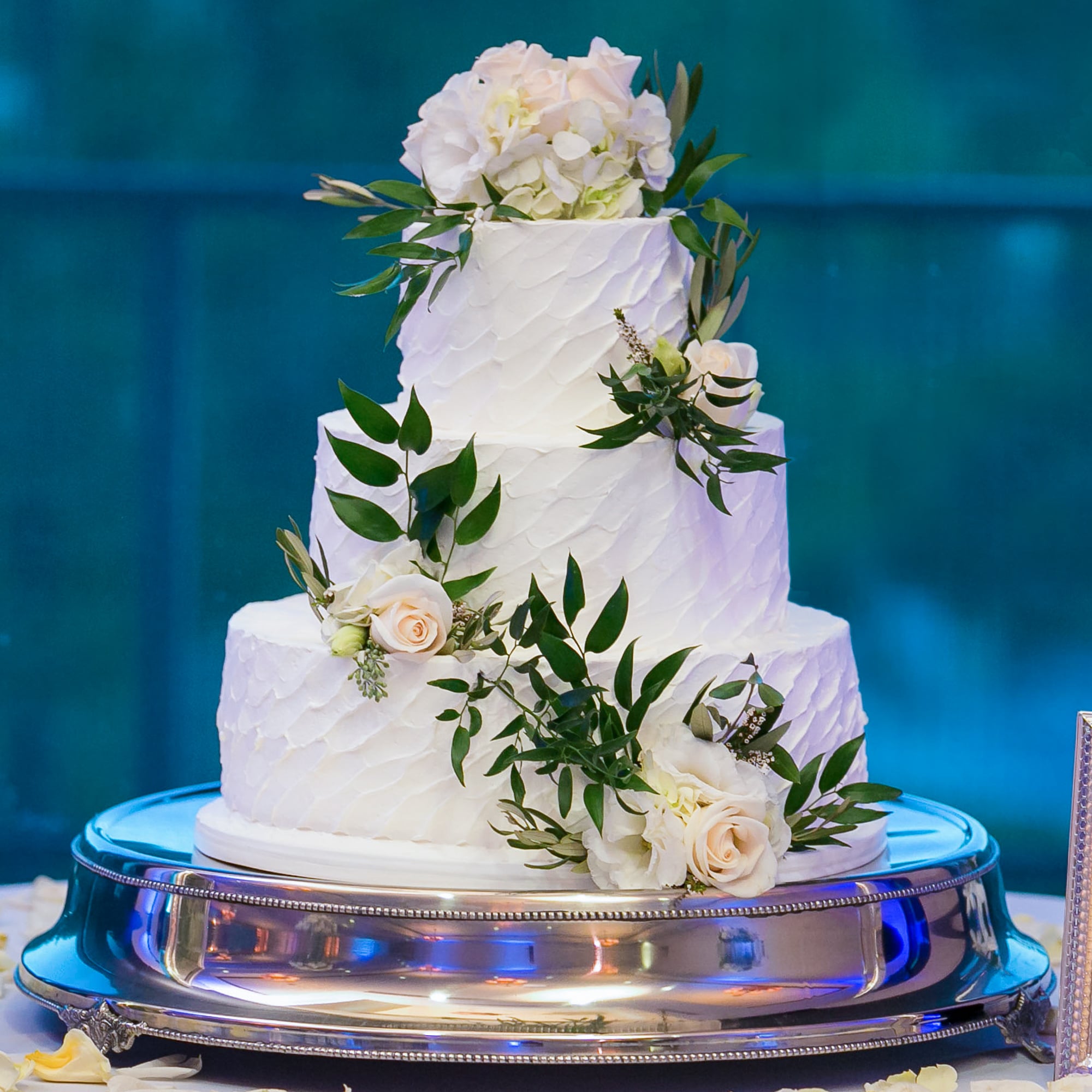 Photo of a angle textured white wedding cake - Patty's Cakes and Desserts