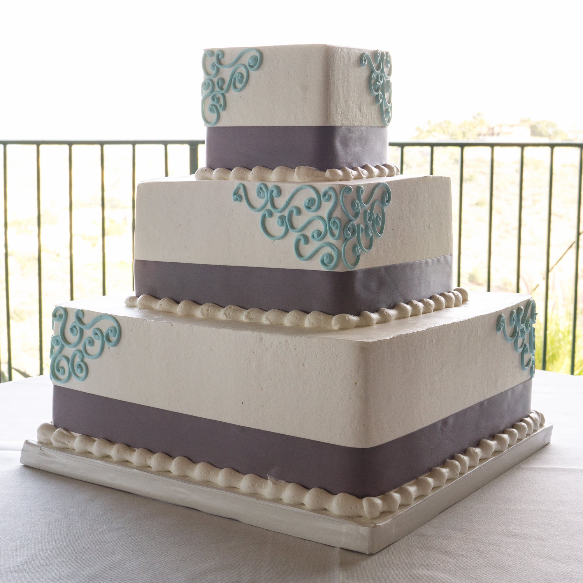 Photo of a square blue gray wedding cake - Patty's Cakes and Desserts